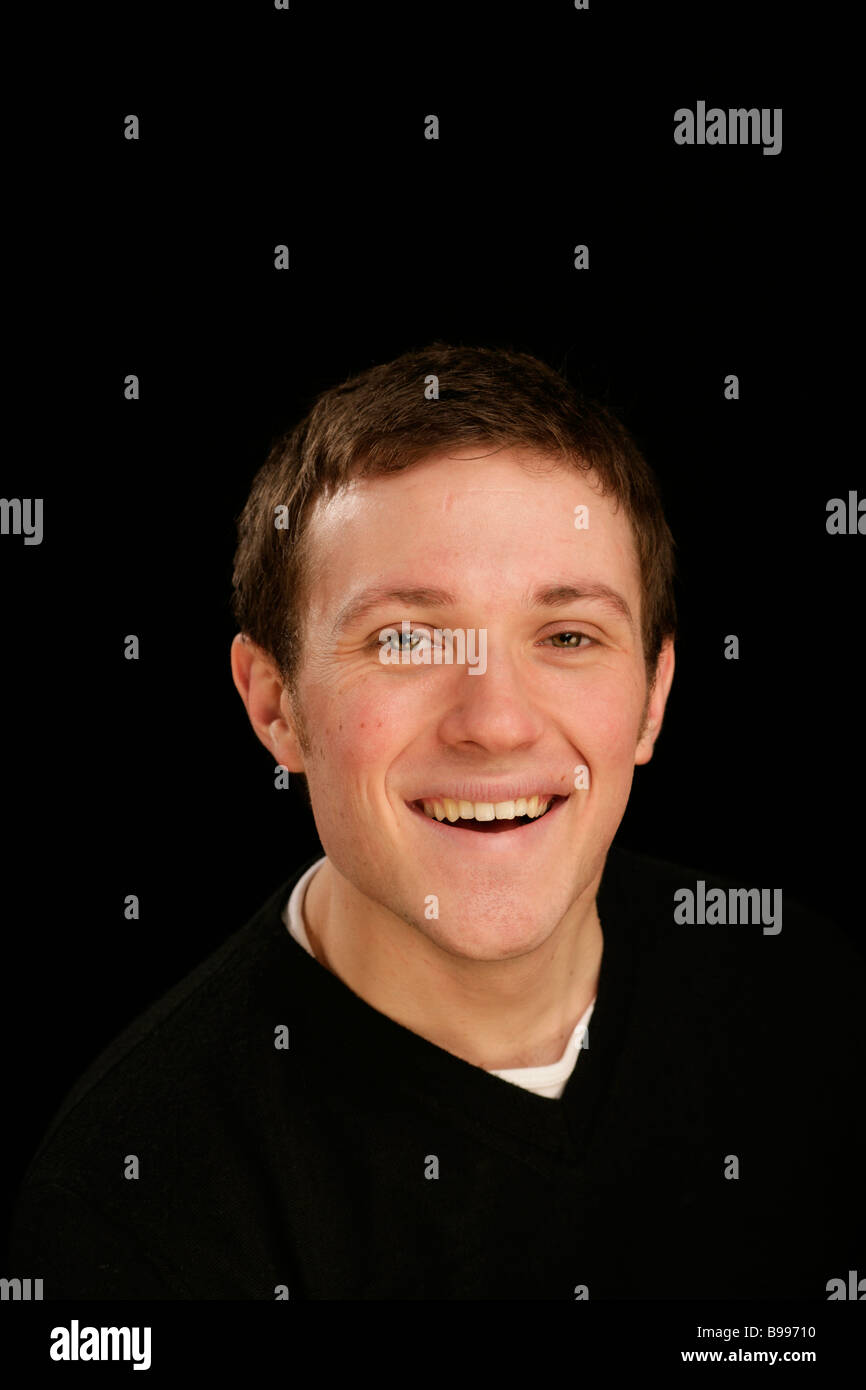 happy teenage lad laughing young handsome man head and shoulders cool ...