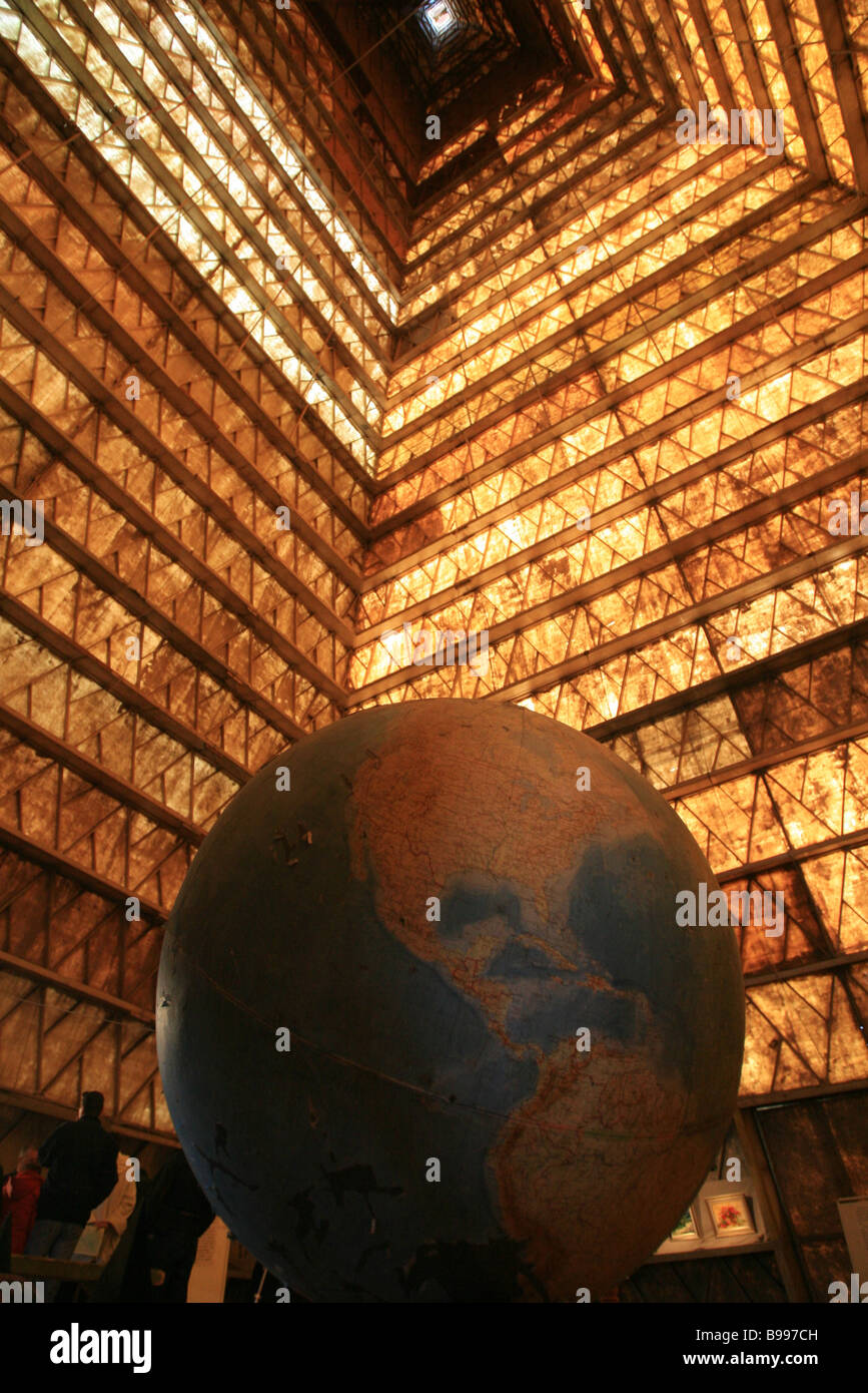 A globe inside a pyramid on the Novorizhskoye Highway near Moscow Stock ...
