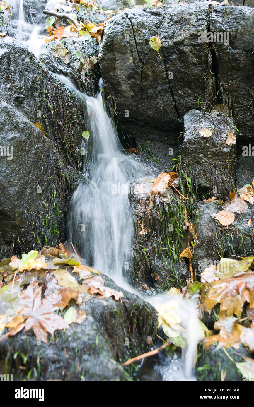 Water flowing over rocks, close-up Stock Photo - Alamy