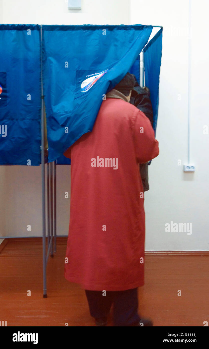 A voter in a polling booth Stock Photo - Alamy