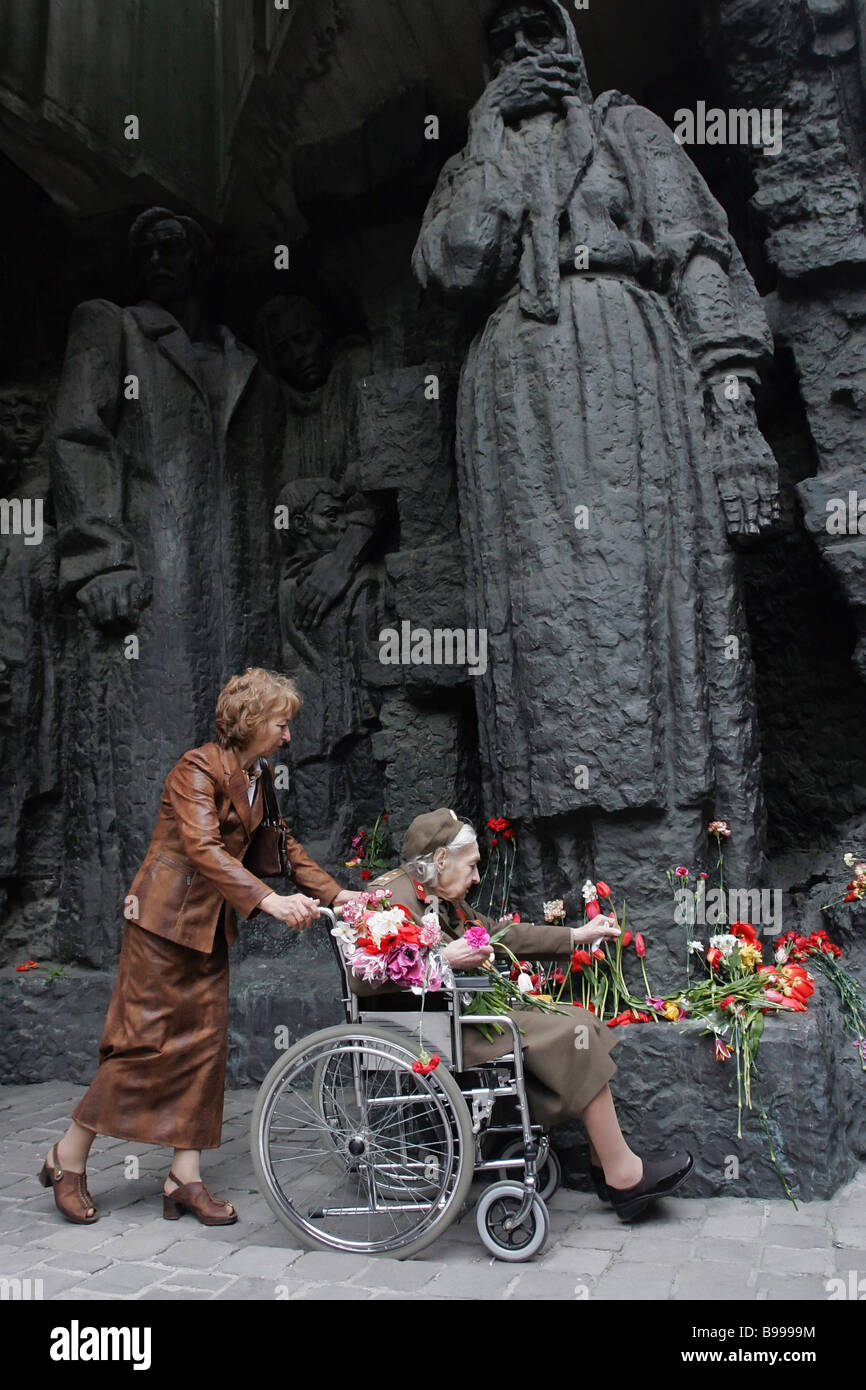 A wheelchair ridden WWII veteran is wearing her wartime uniform to lay ...