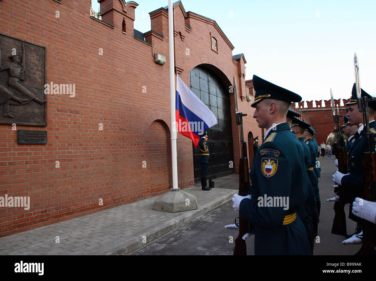 The Presidential Regiment man lowering the Russian national flag in the ...