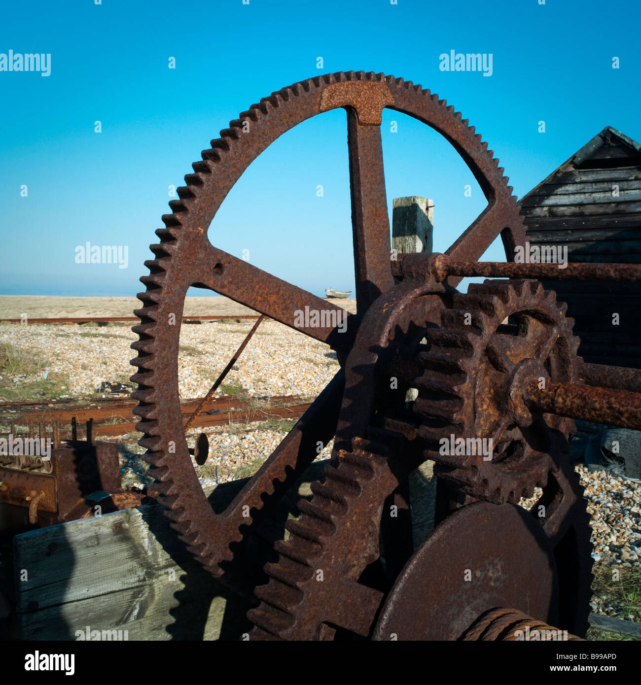 Old winch mechanism for hauling fishing boats onto a shingle beach ...