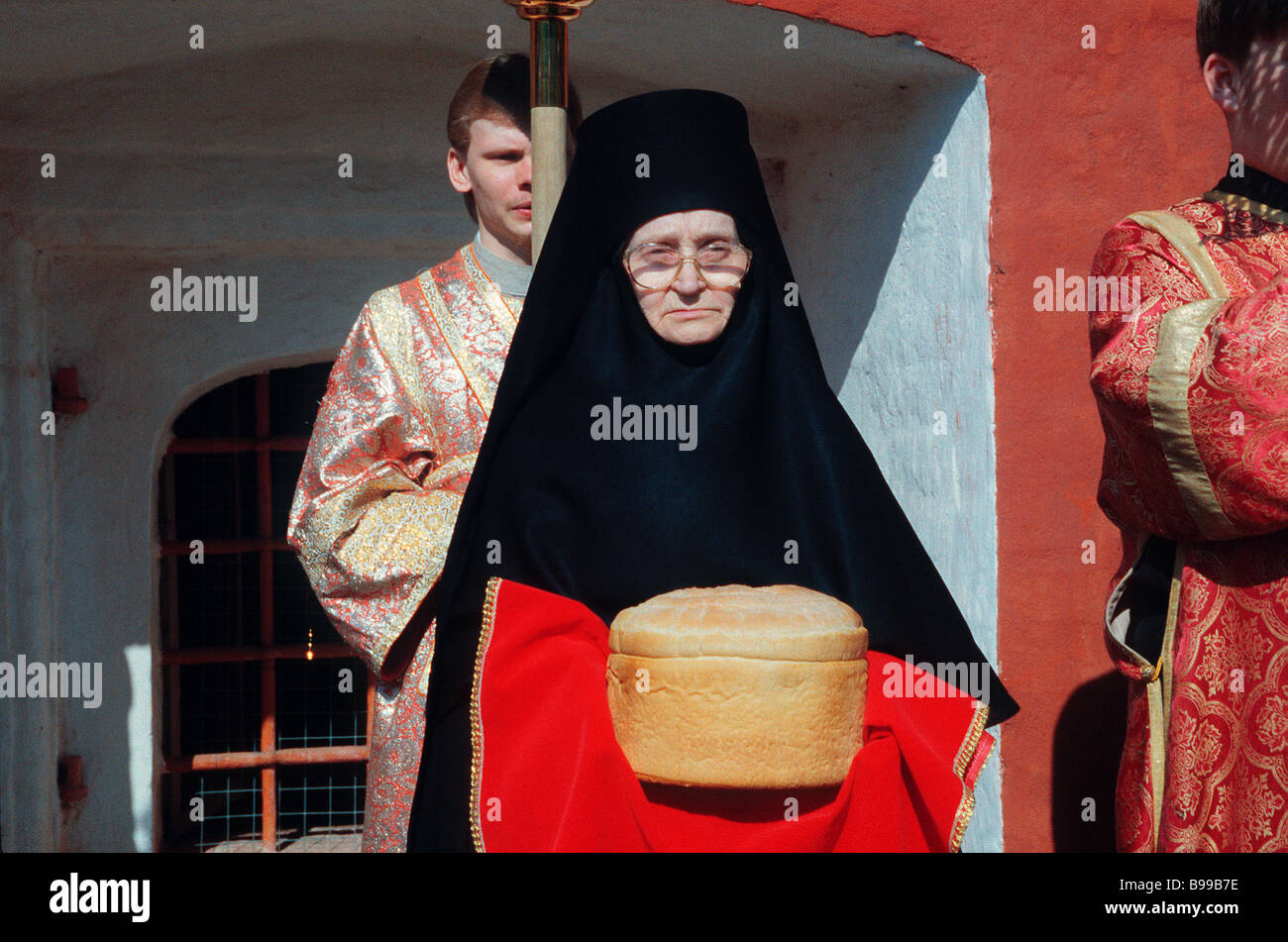 A Novodevichy Convent nun with an Easter cake before the start of a ...
