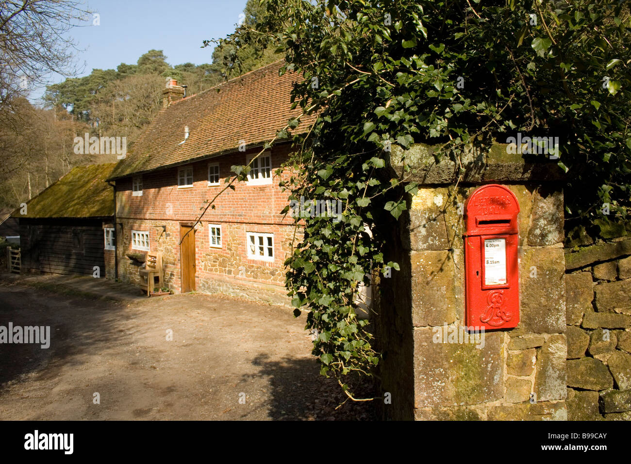 Old country post box in stone wall Stock Photo - Alamy