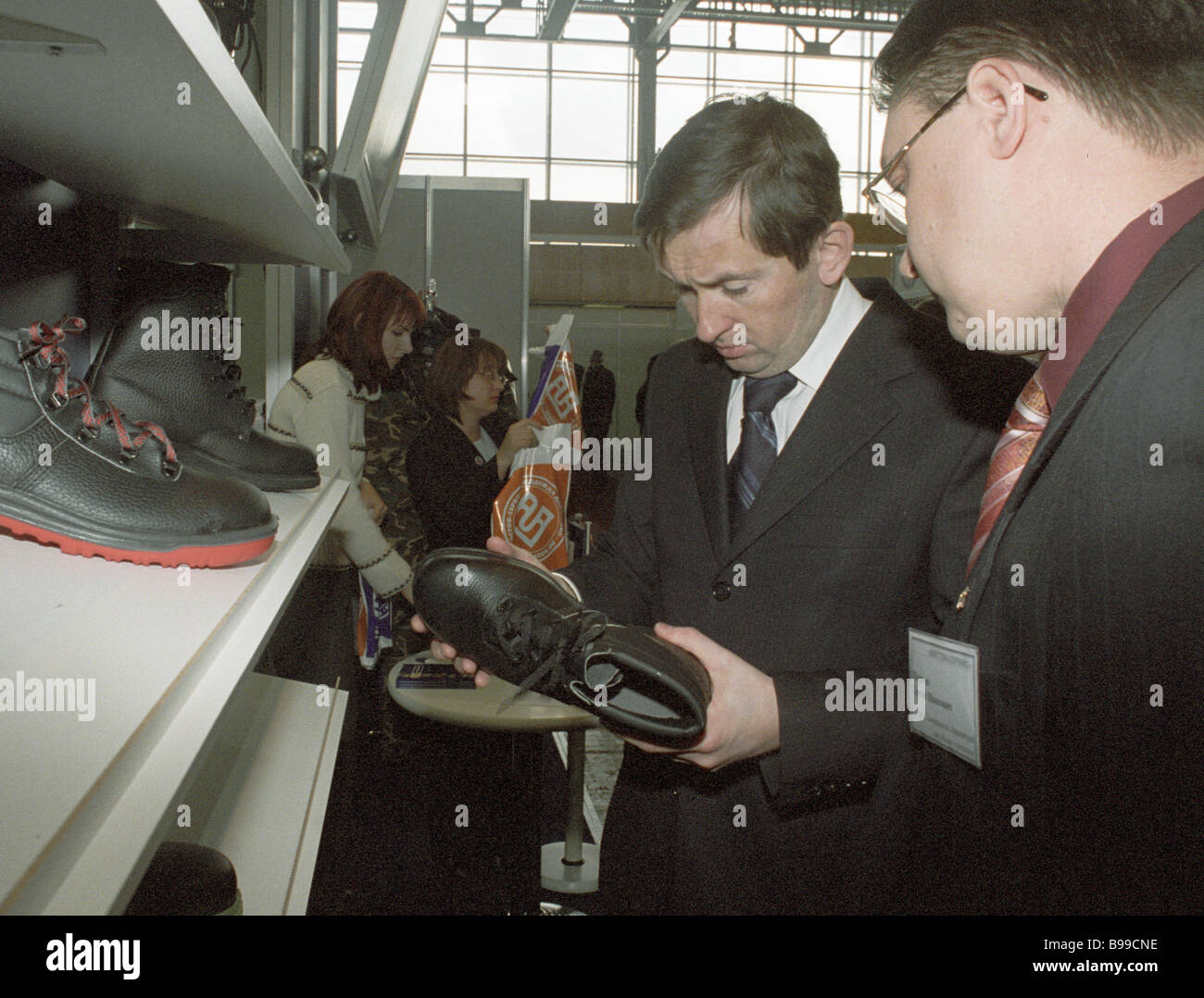 Labor and Social Development Minister Alexander Pochinok viewing ...