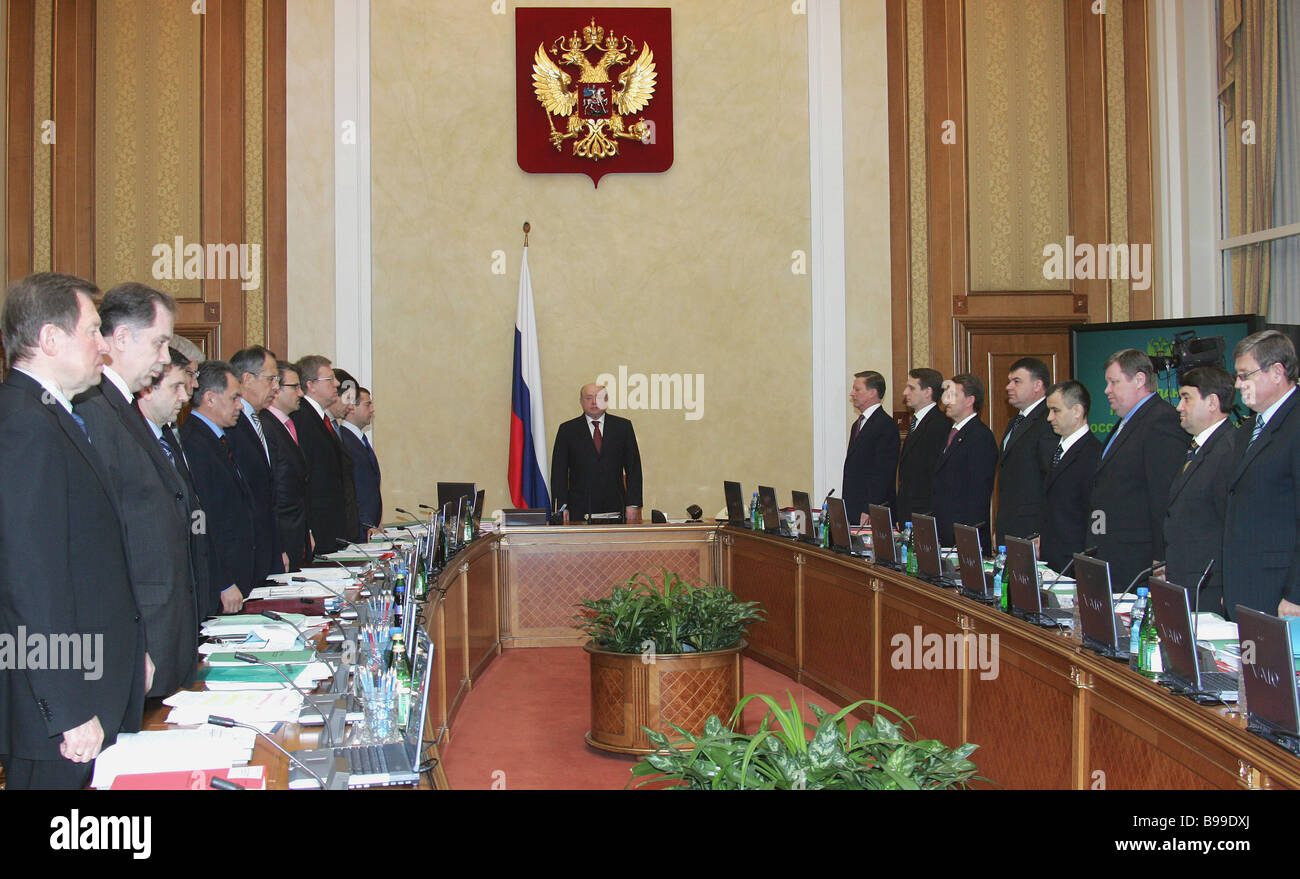 Members of the Russian Government stand in silence before their session ...