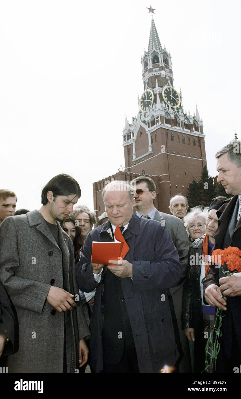 The KPRF leader Gennady Zyuganov center autographing on Red Square ...