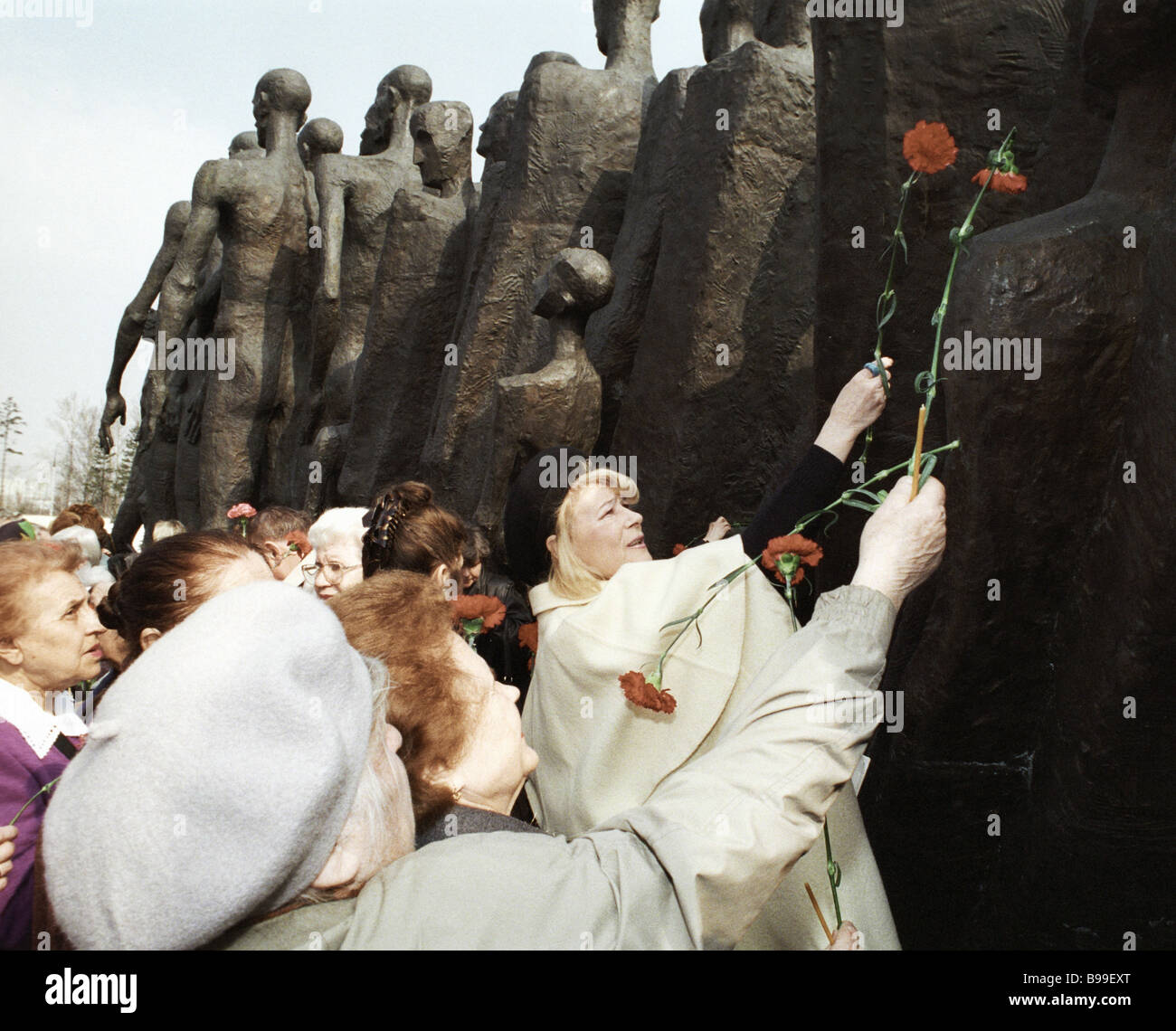 Laying flowers to the monument Tragedy of Peoples in connection to the ...