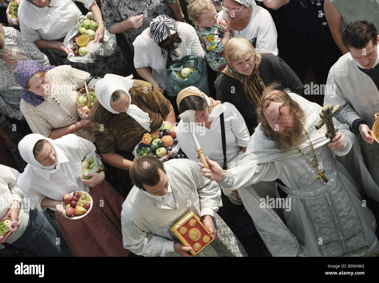 The procession with the cross before blessing apples during The ...