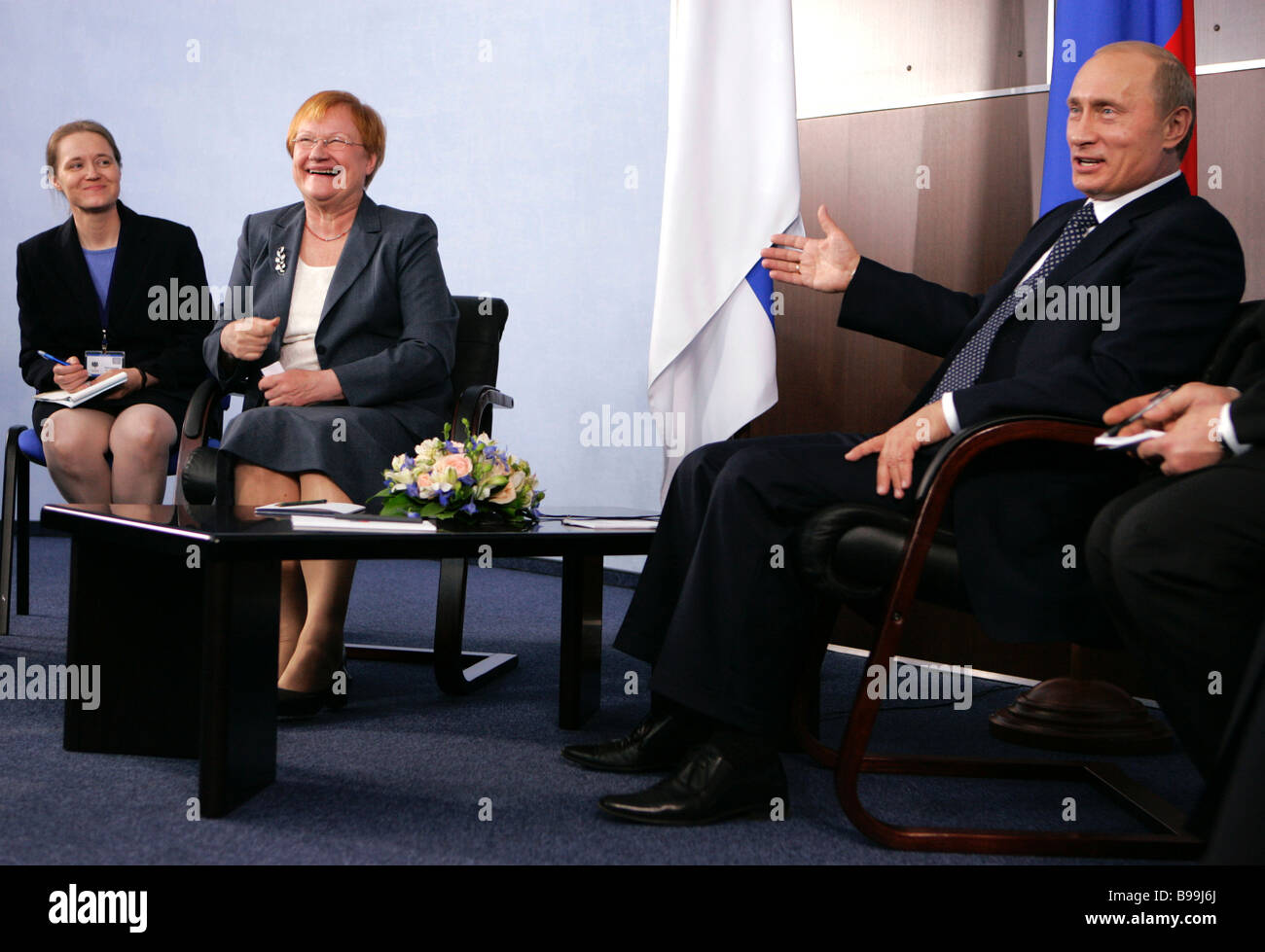 Presidents Tarja Halonen of Finland and Vladimir Putin of Russia second ...