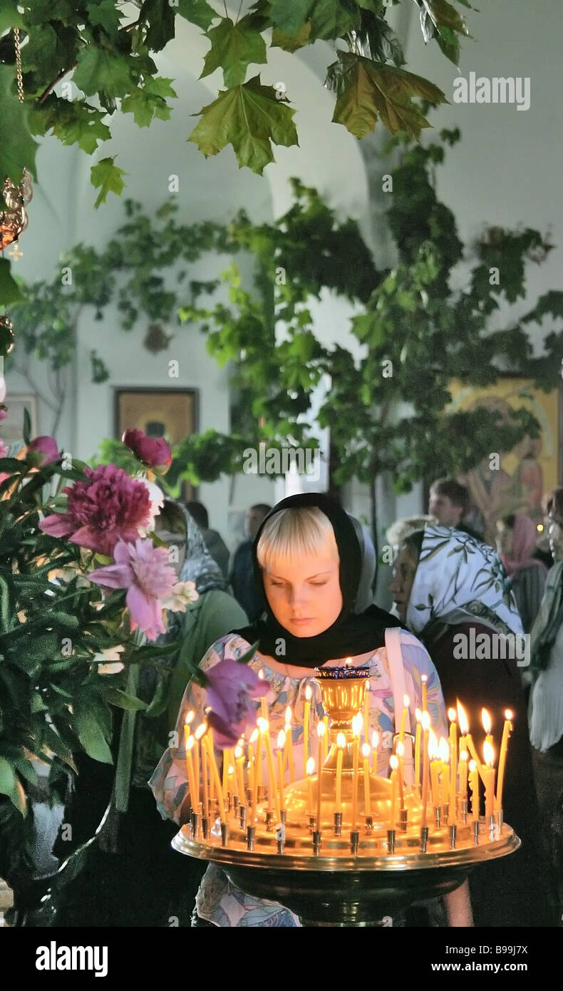 Orthodox believers celebrating Holy Trinity Day According to the ...