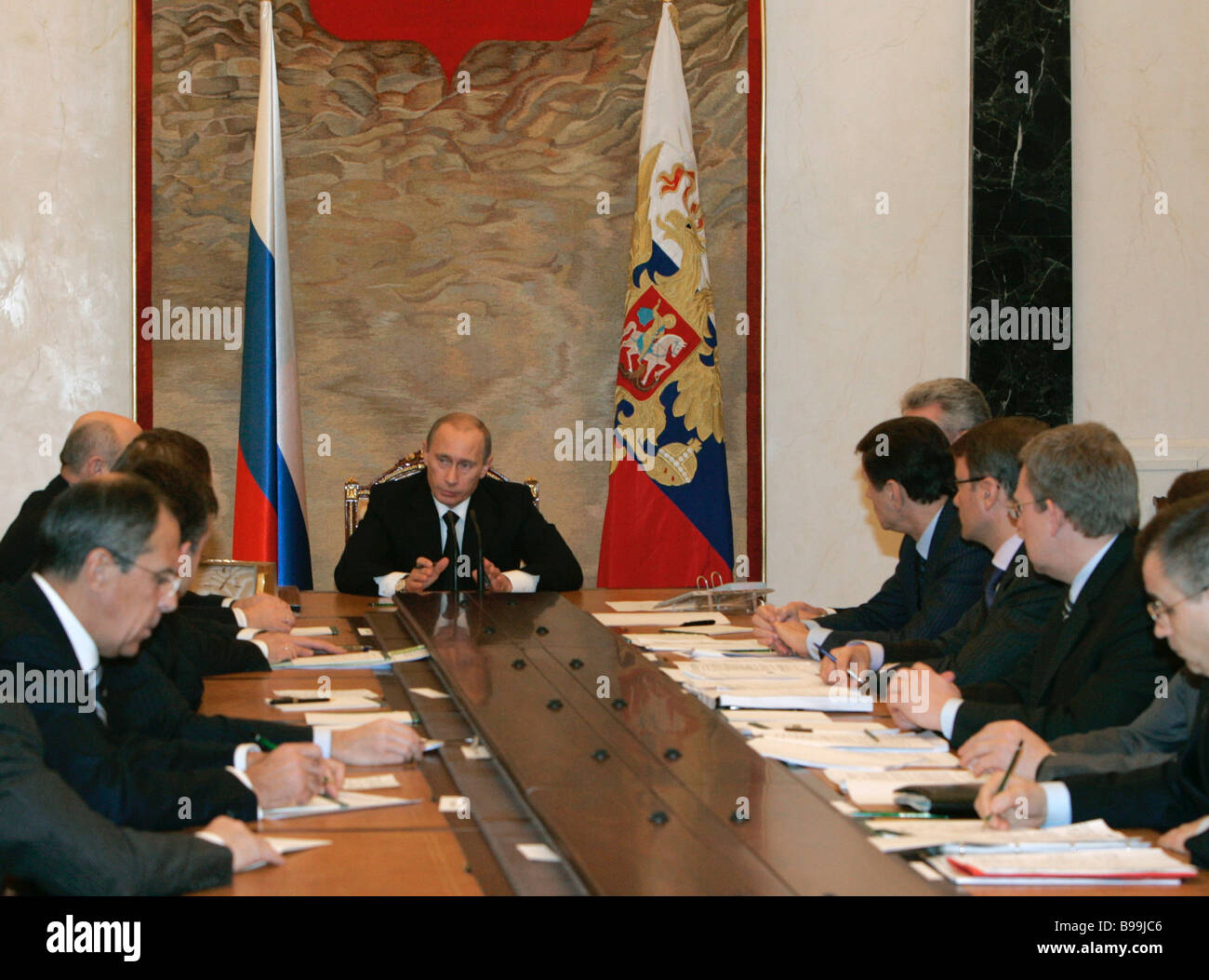 President Vladimir Putin center conferring with cabinet members in the ...