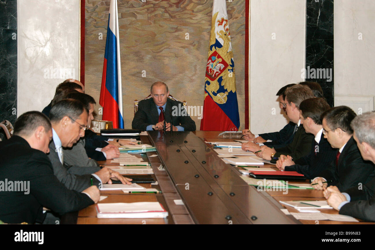 Russian President Vladimir Putin center holding a conference with the ...