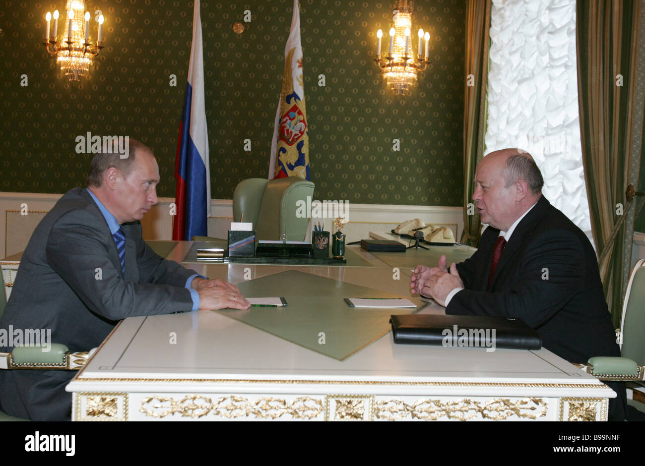 President Vladimir Putin and Prime Minister Mikhail Fradkov left to ...