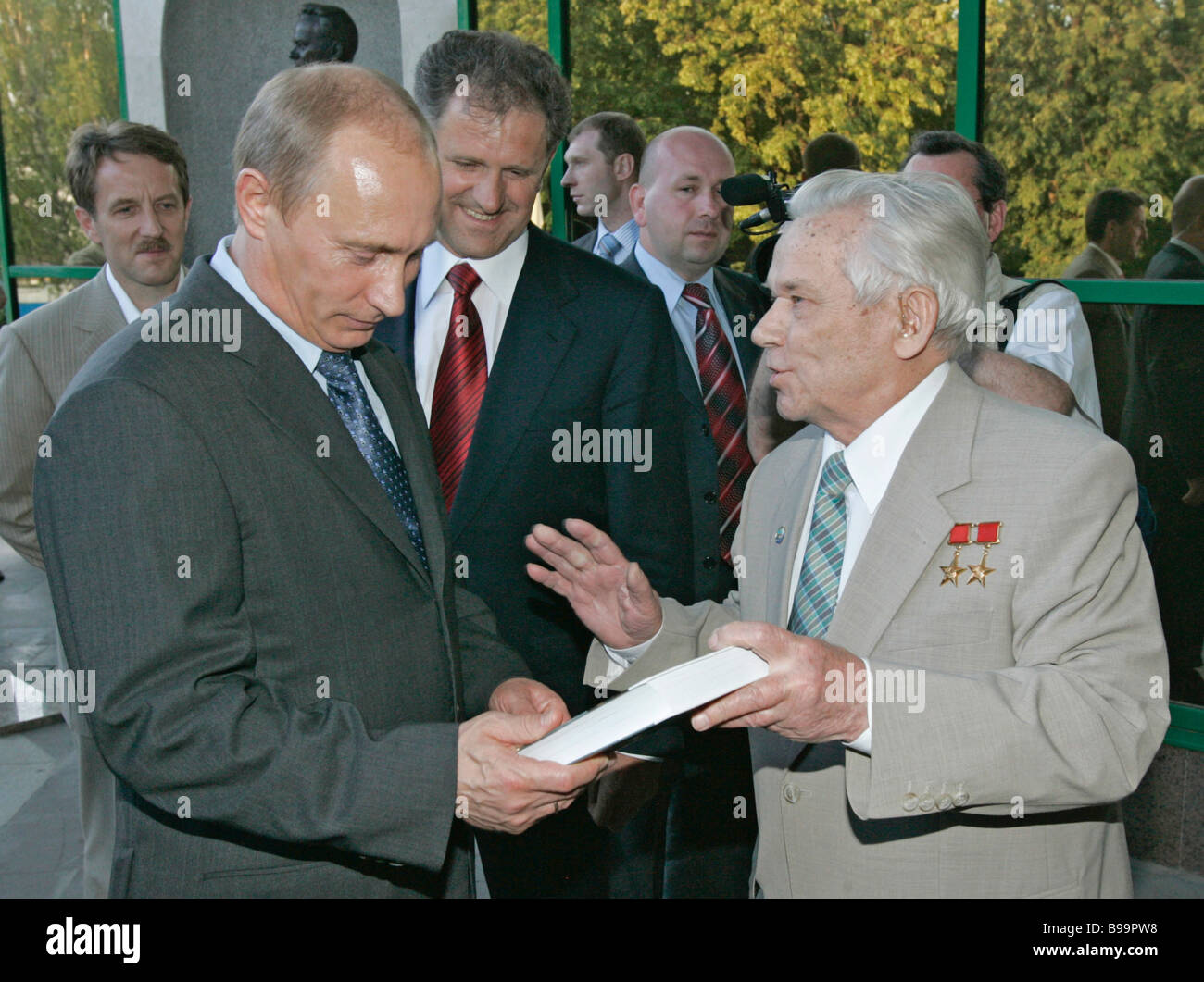 President Vladimir Putin and small arms designer Mikhail Kalashnikov ...