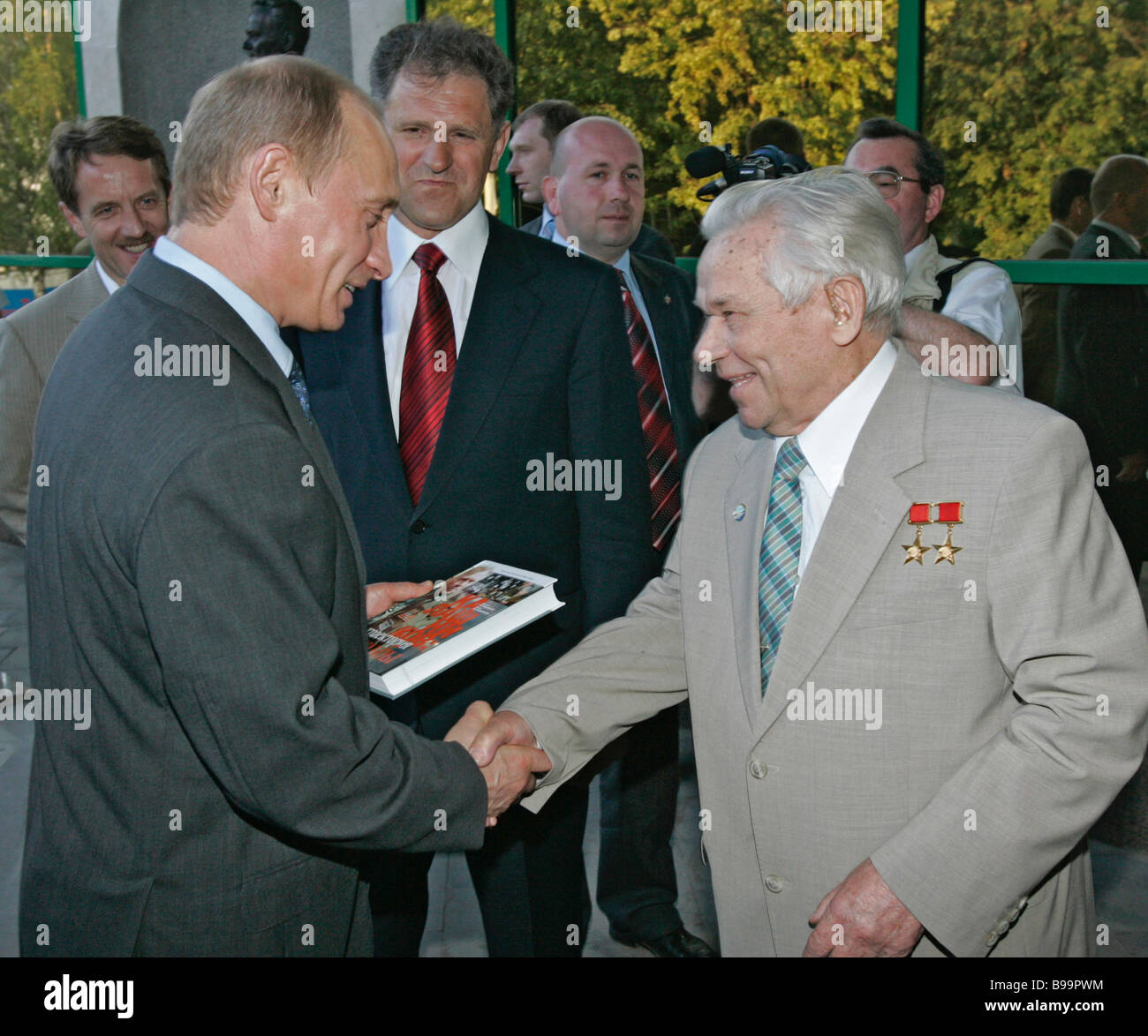 President Vladimir Putin and small arms designer Mikhail Kalashnikov ...