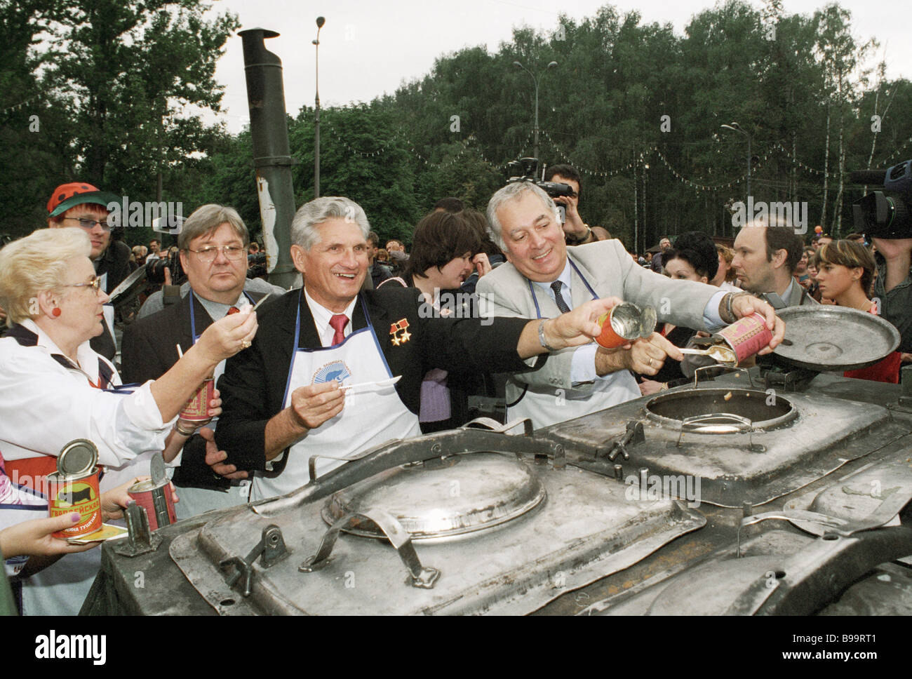Left to right foreground television announcer Anna Shatilova cosmonaut ...