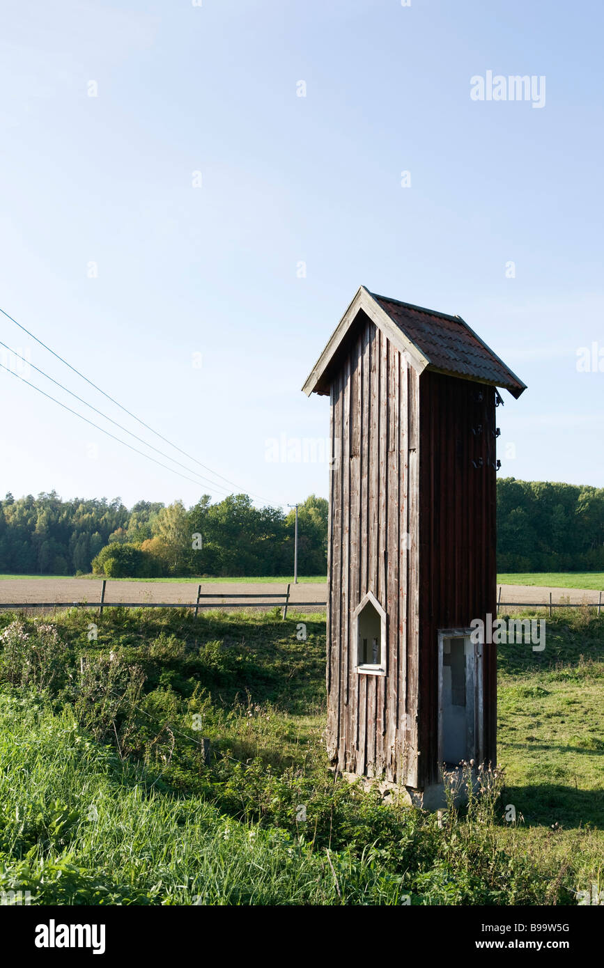 Wooden tower in field Stock Photo - Alamy