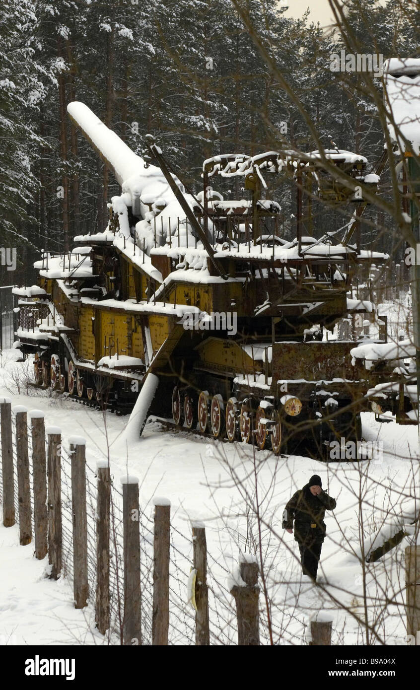 These large caliber naval guns mounted on trucks are exhibited in the ...