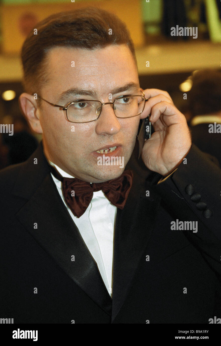 The producer of Igra Boris Kryuk speaking on the phone in the Rossiya ...
