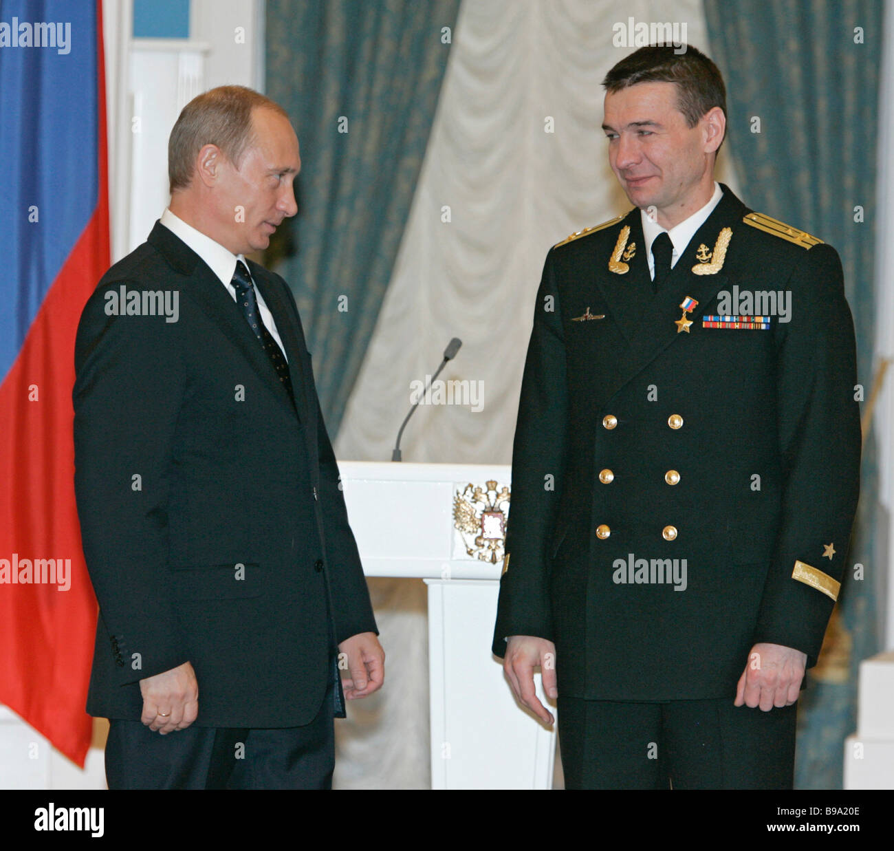 Russian President Vladimir Putin left presented the Hero of Russia Star ...