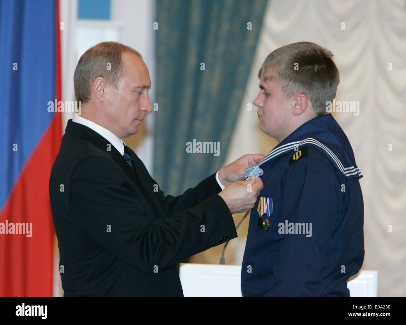 Russian President Vladimir Putin left presented the Ushakov Medal to ...