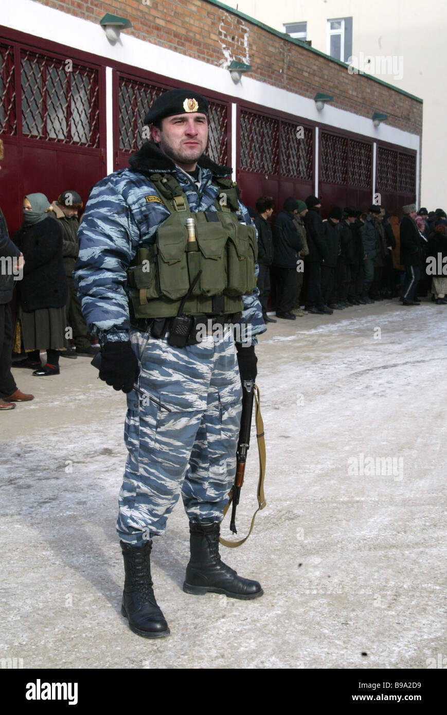 An OMON police officer and detained lawbreakers in a remand center of ...