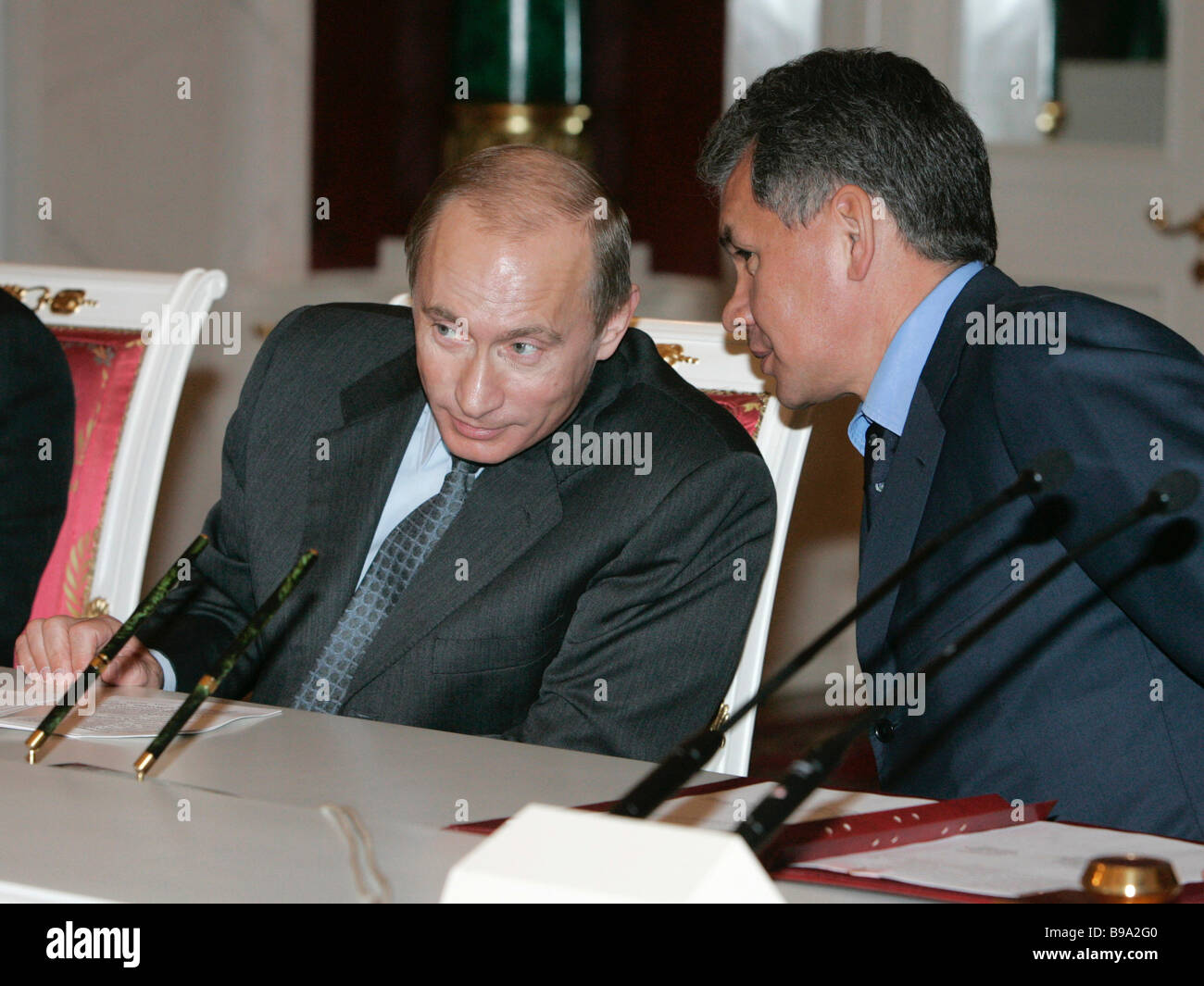 Russian President Vladimir Putin and Emergencies Minister Sergei Shoigu ...