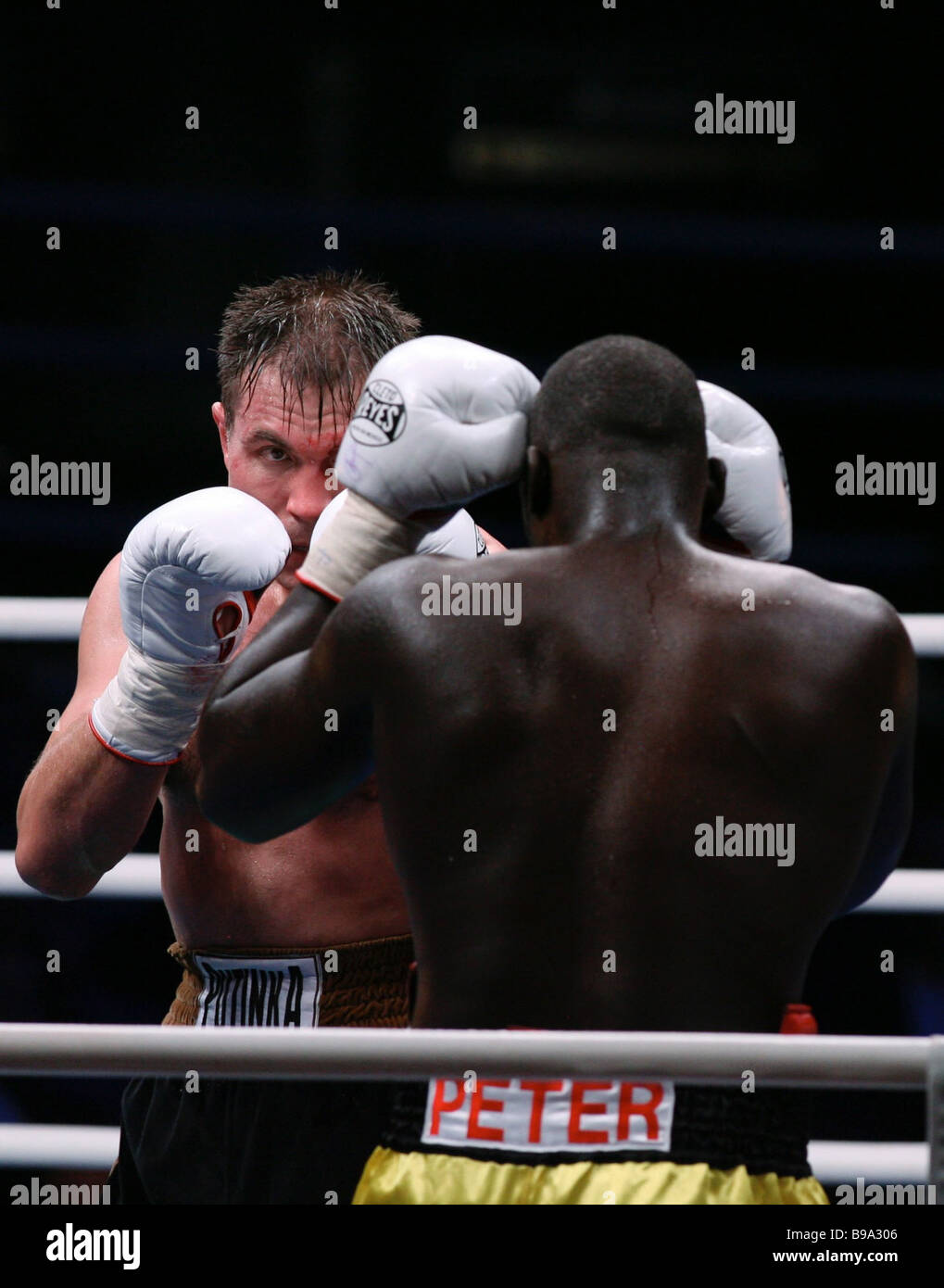 World WBC super heavy weight champion Oleg Maskayev and boxer Peter Okhello foreground in tthe ...