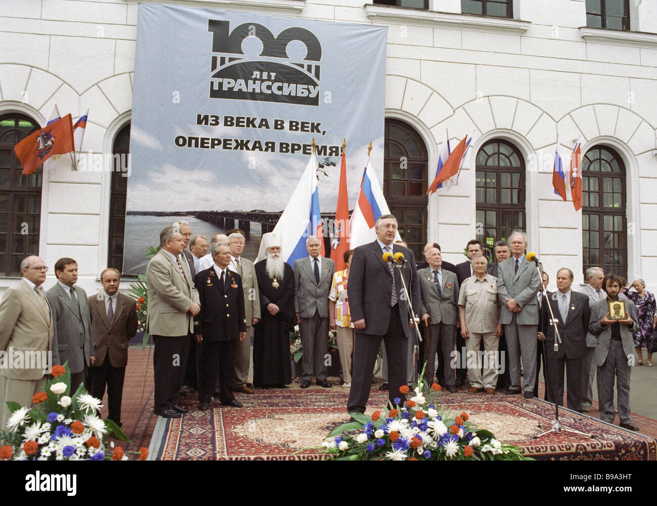 Russian Minister of Railways Nikolai Aksenenko centre speaking at the ...