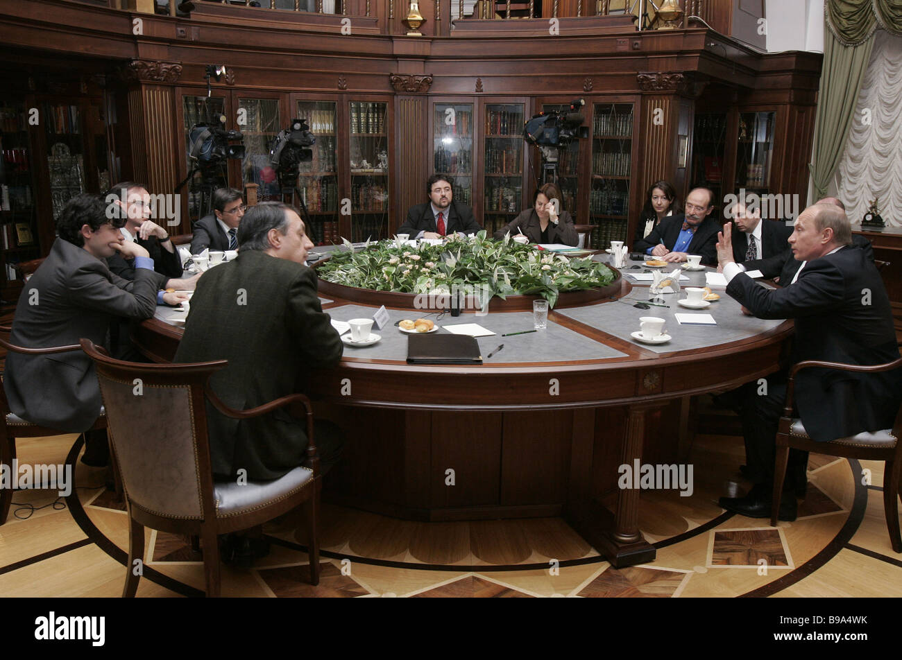 Russia s President Vladimir Putin right met Spanish media ...