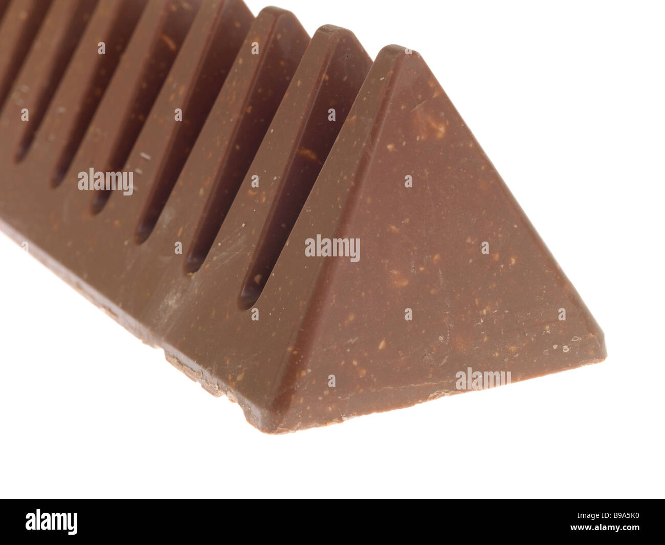 Bar of Triangular Shaped Honey And Nut Swiss Chocolate Dessert Bar ...