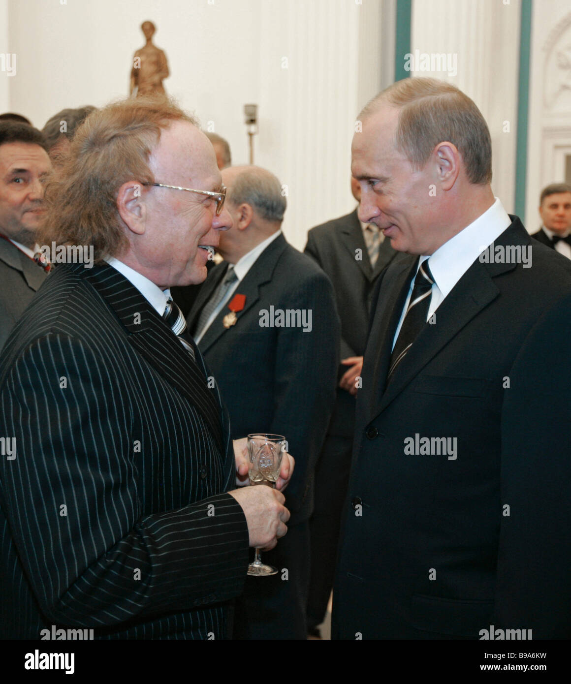 The writer and TV host Edward Radzinsky left and President Vladimir ...