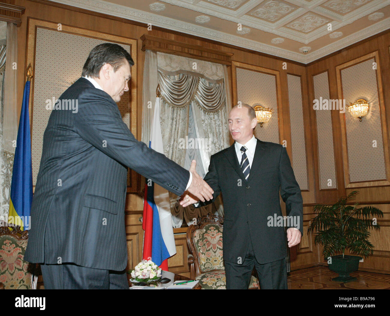 Russian President Vladimir Putin right and Ukrainian Prime Minister ...