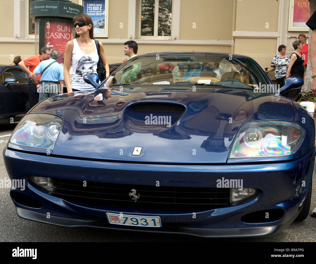 Blue Ferrari parked outside the Hotel du Paris, Monaco, Monte Carlo ...