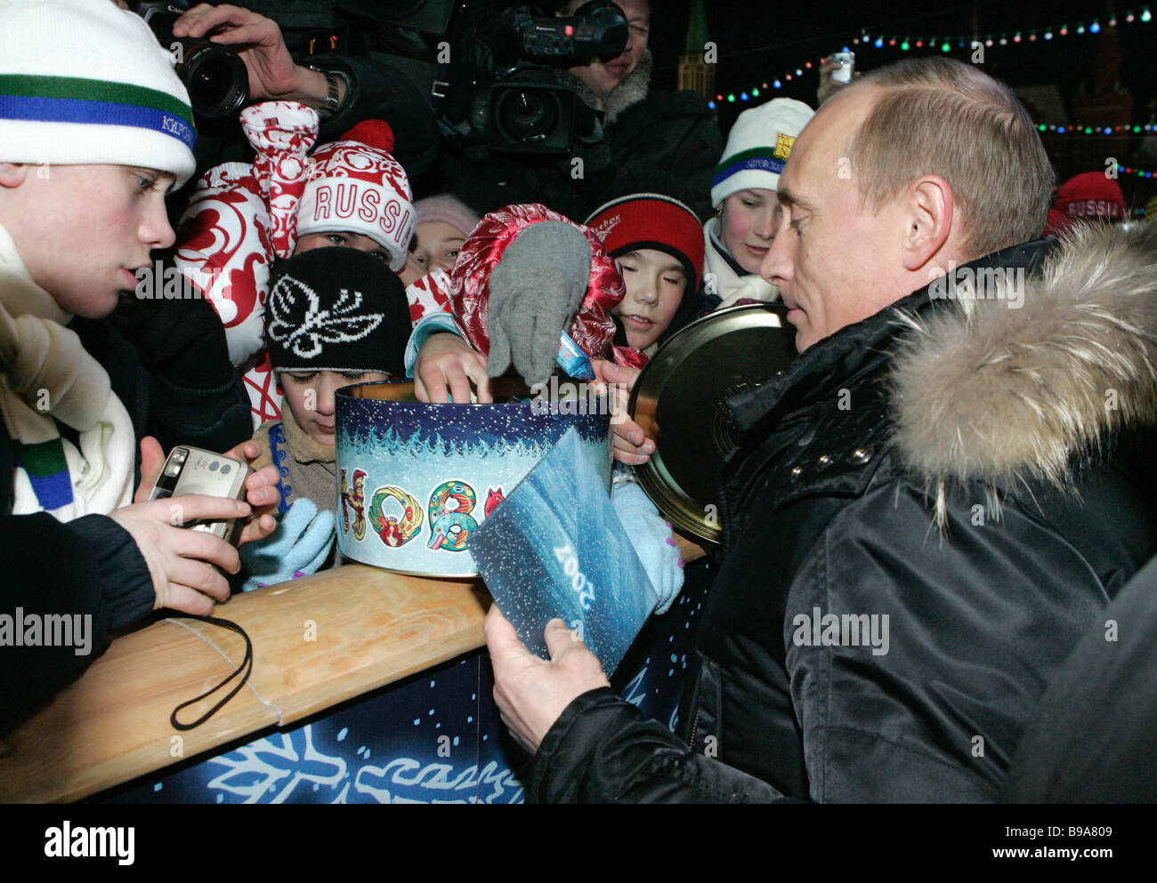 Russian President Vladimir Putin visits the Red Square skating rink ...