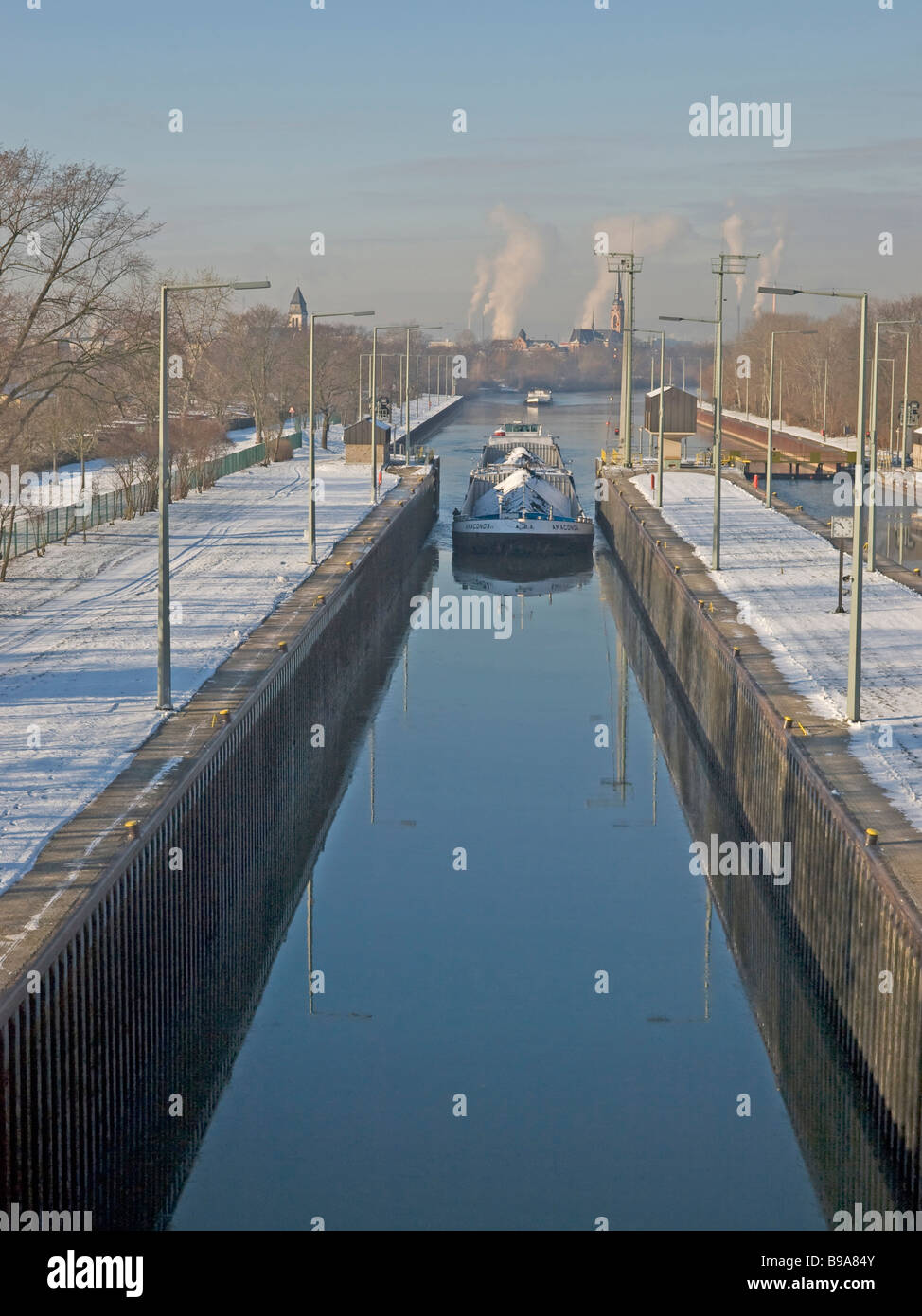 transport a barge with snow on the river Main at barrage in sluice by ...