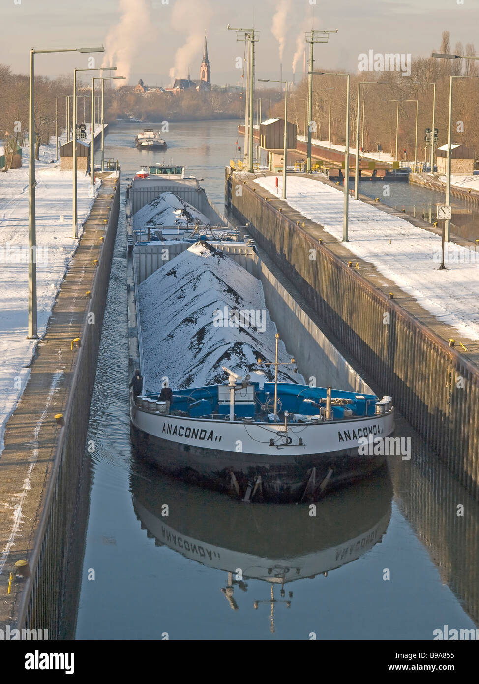 transport a barge with snow on the river Main at barrage in sluice by ...