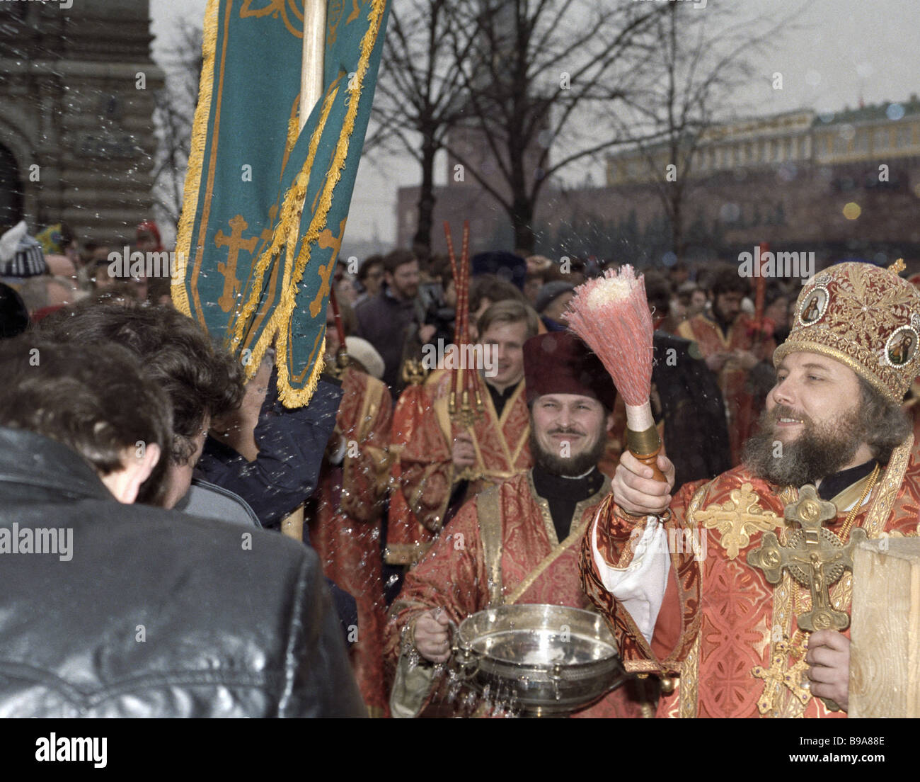 Sprinkling believers with holy water on the day of Christ s ...