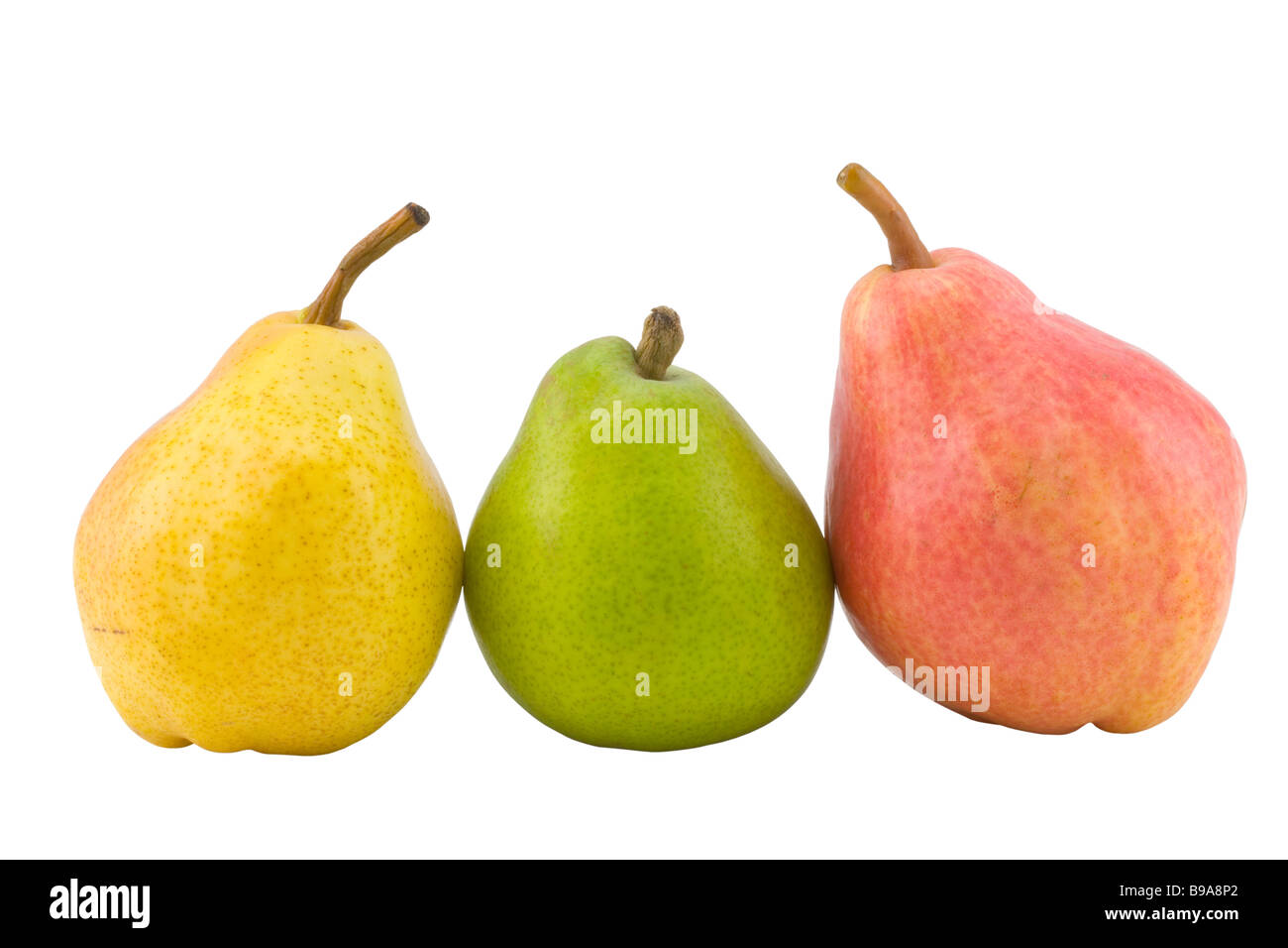 the three full pears isolated with clipping path Stock Photo - Alamy