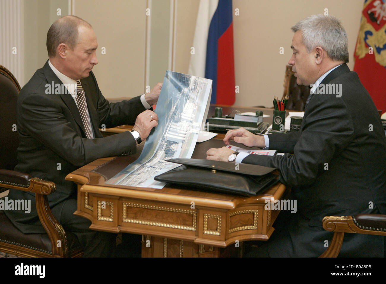 President Vladimir Putin and the LUKoil Company head Vagit Alekperov ...