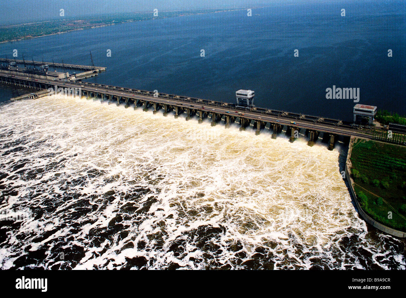 During a spring flood time the Volga River level increased by 5 meters ...