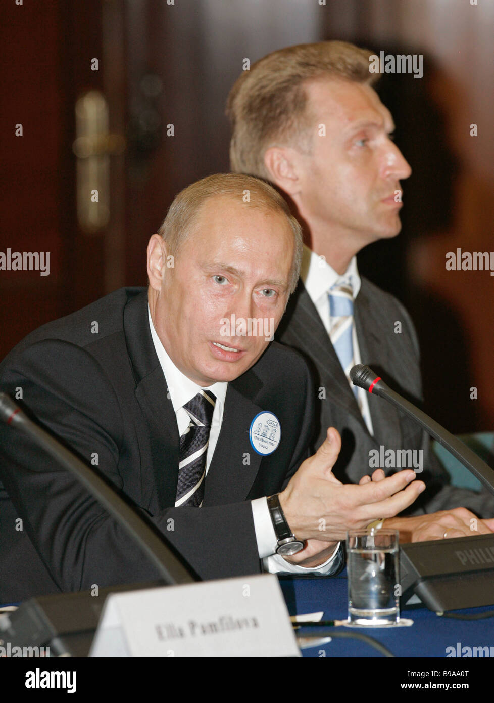 Russian President Vladimir Putin and his aide Igor Shuvalov left to ...