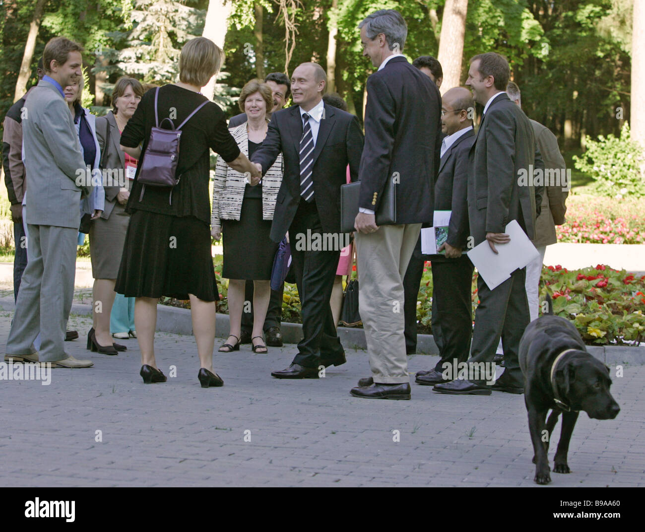 Russia s President Vladimir Putin center and Connie his Labrador ...