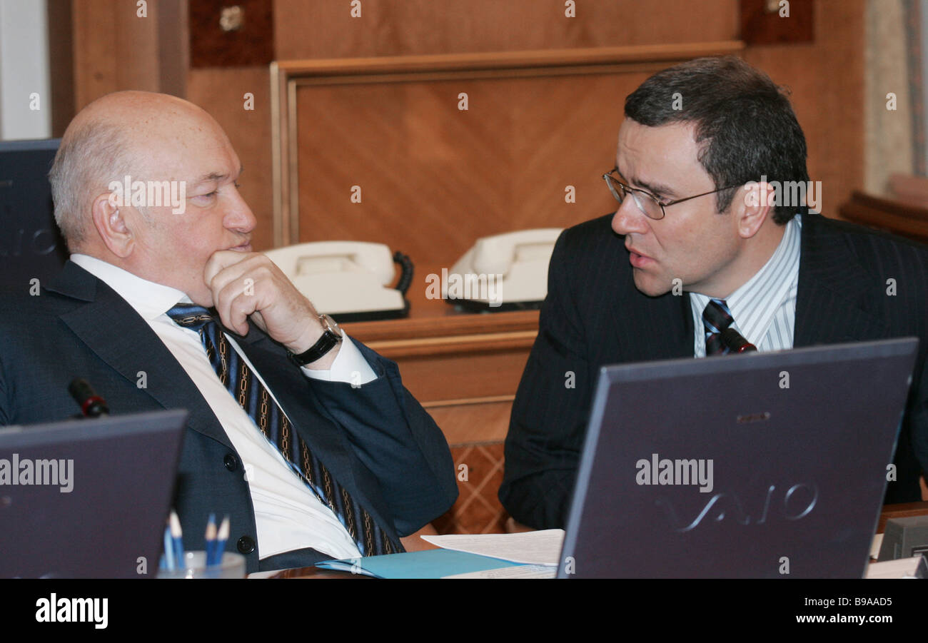 Moscow s Mayor Yuri Luzhkov left and Dmitry Zelenin Tver regional ...
