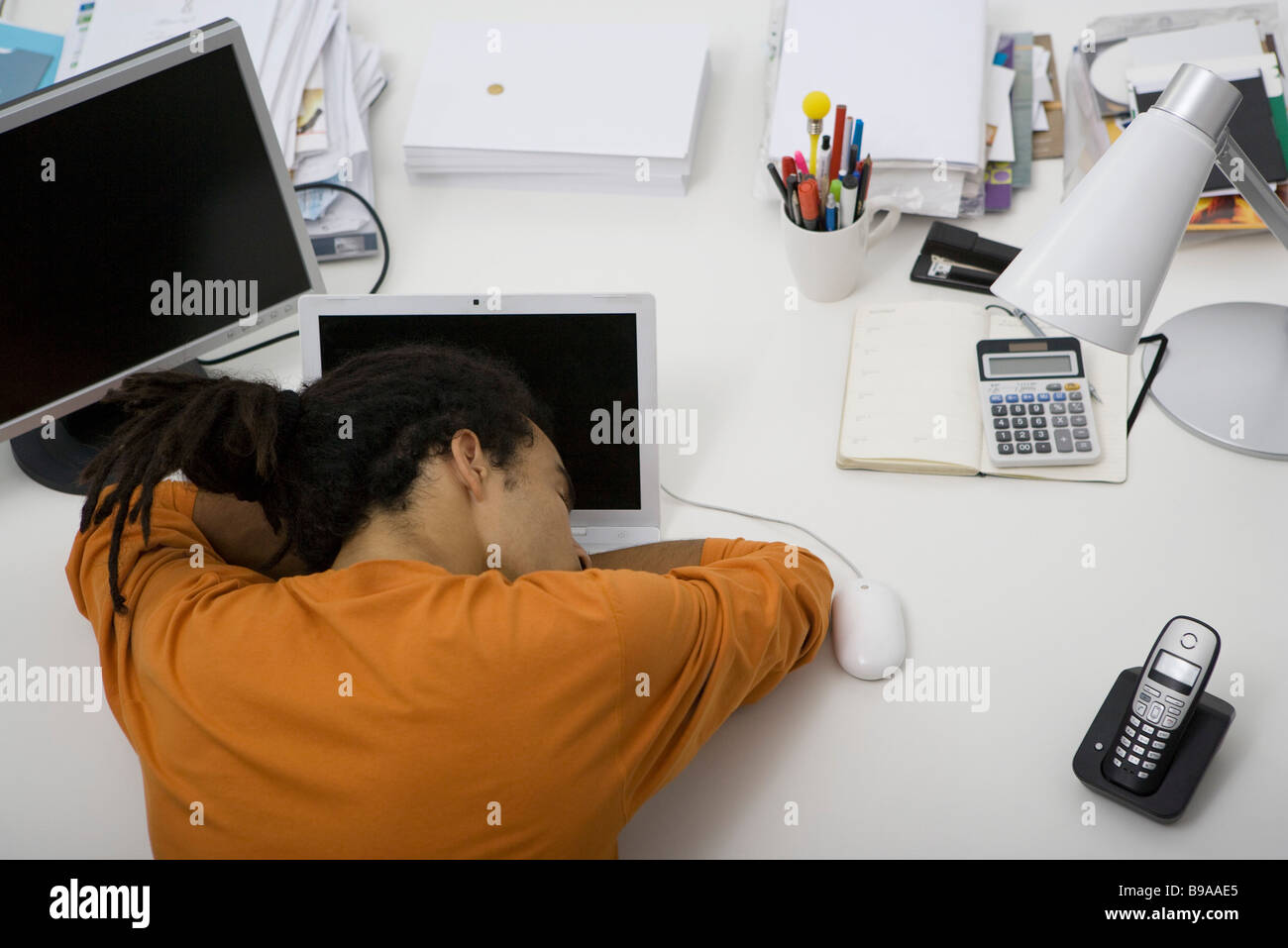 Man napping at desk, overhead view Stock Photo - Alamy