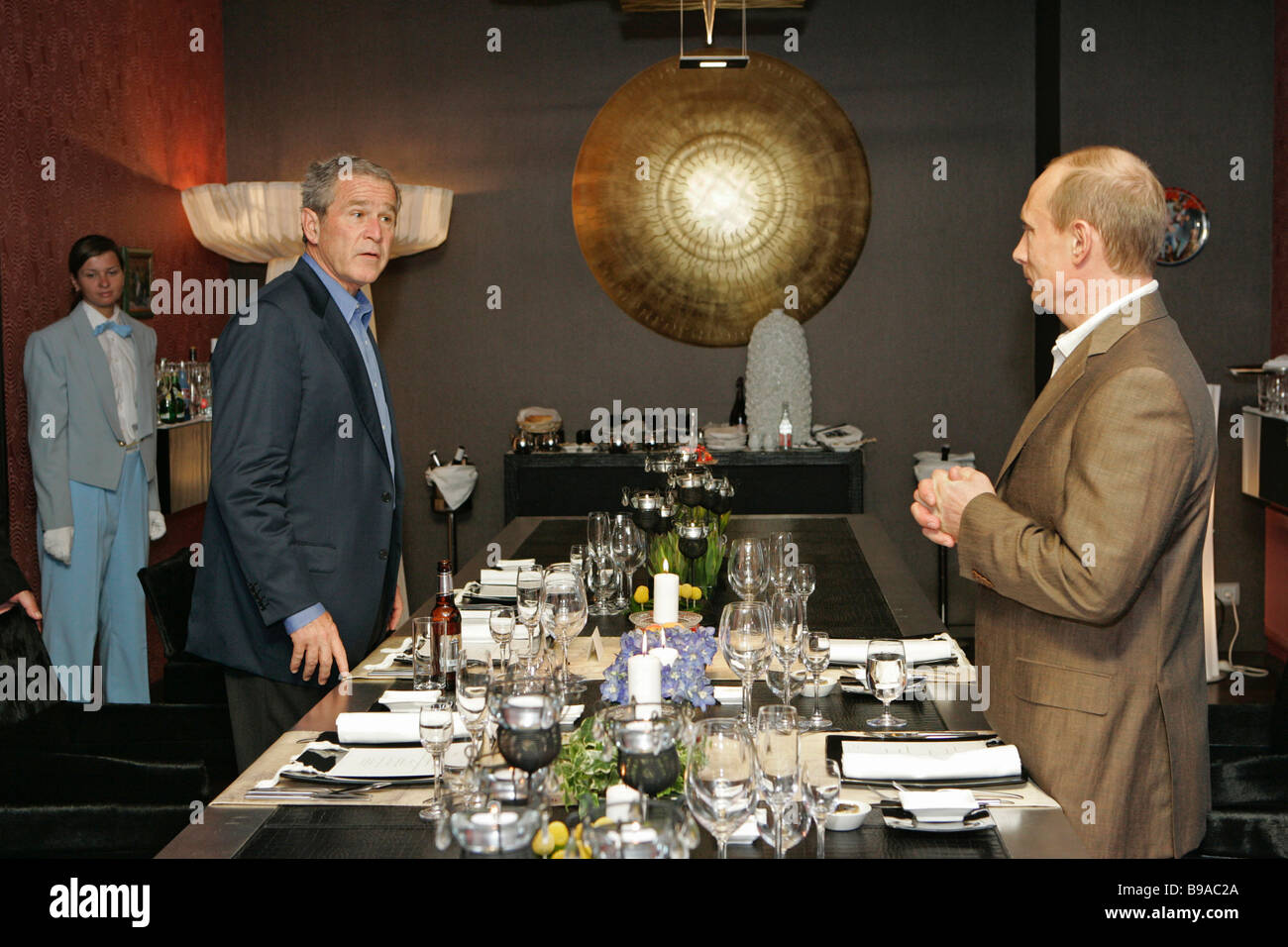 American and Russian Presidents George Bush and Vladimir Putin left to ...