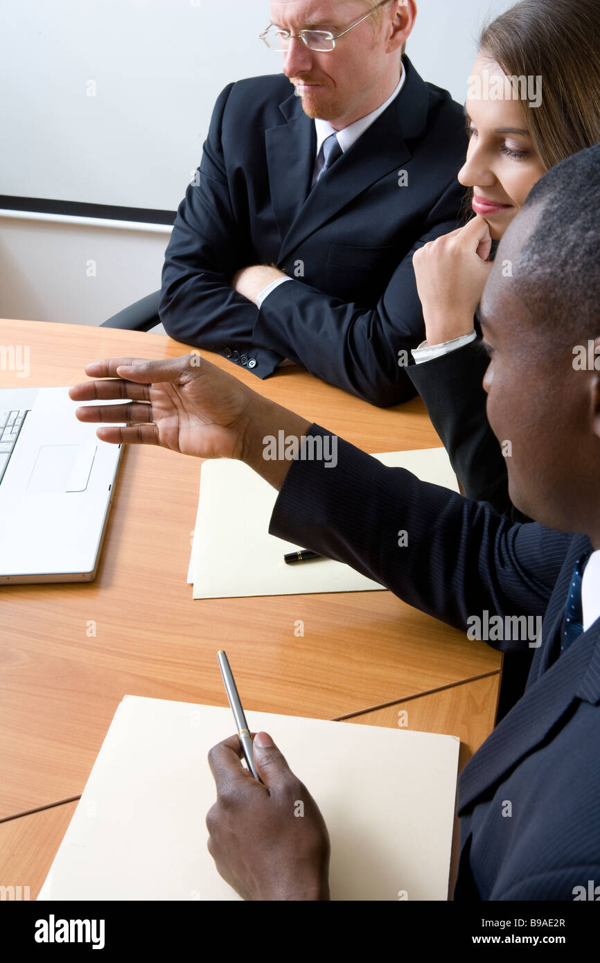 Co workers in business meeting Stock Photo - Alamy