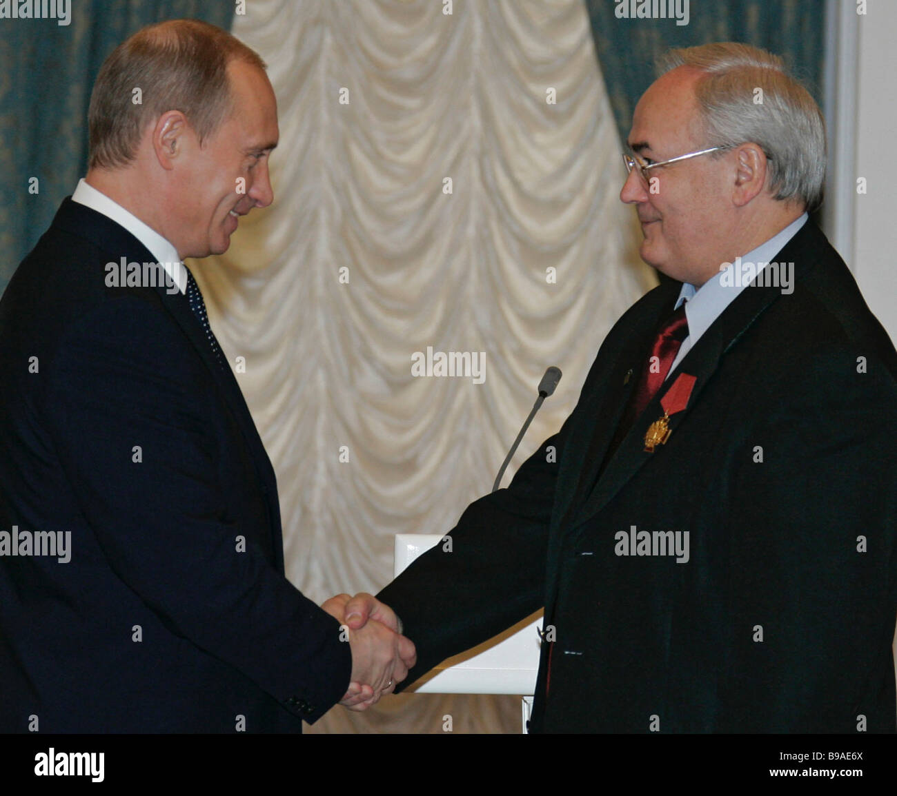 Russian President Vladimir Putin left giving actor and director ...